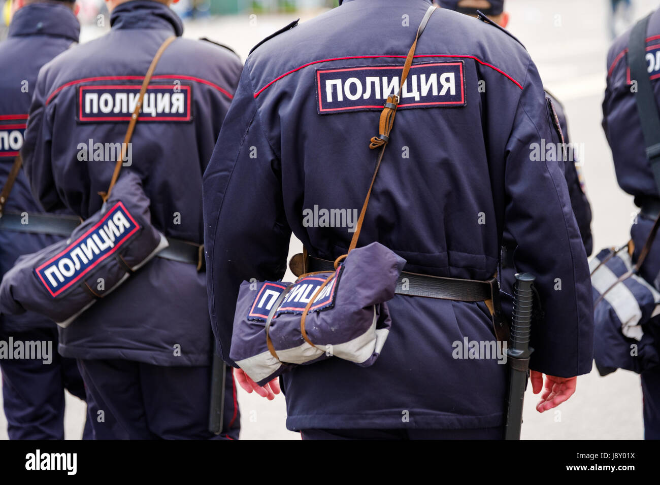 Policemen in uniform rear hi-res stock photography and images - Alamy