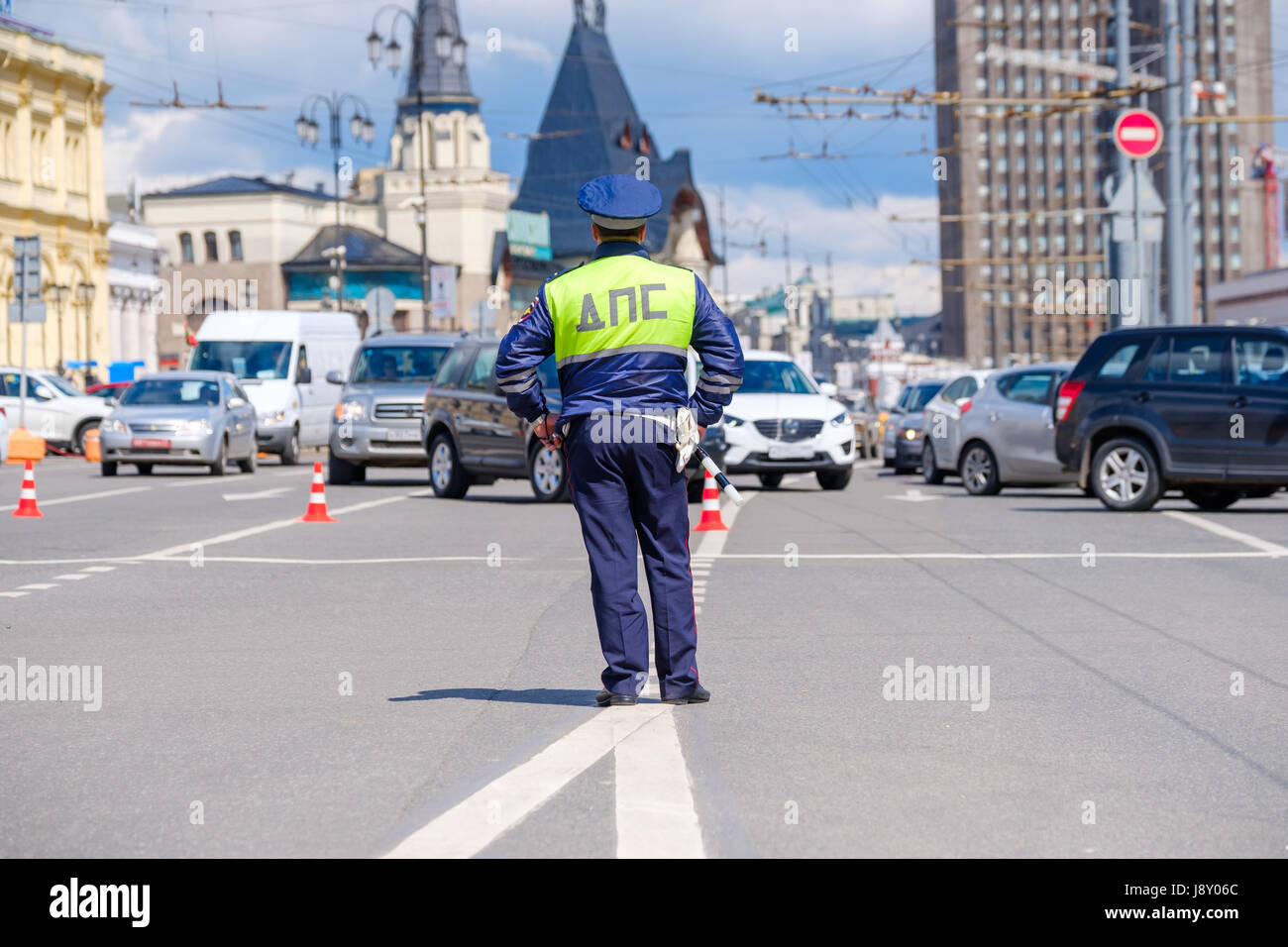 Traffic policeman works on the street at day time Stock Photo - Alamy