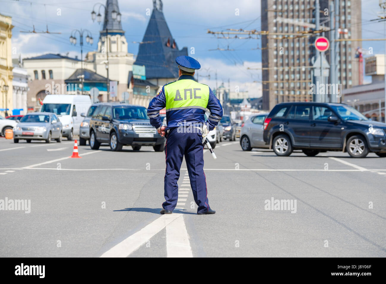 Traffic policeman works on the street at day time Stock Photo - Alamy