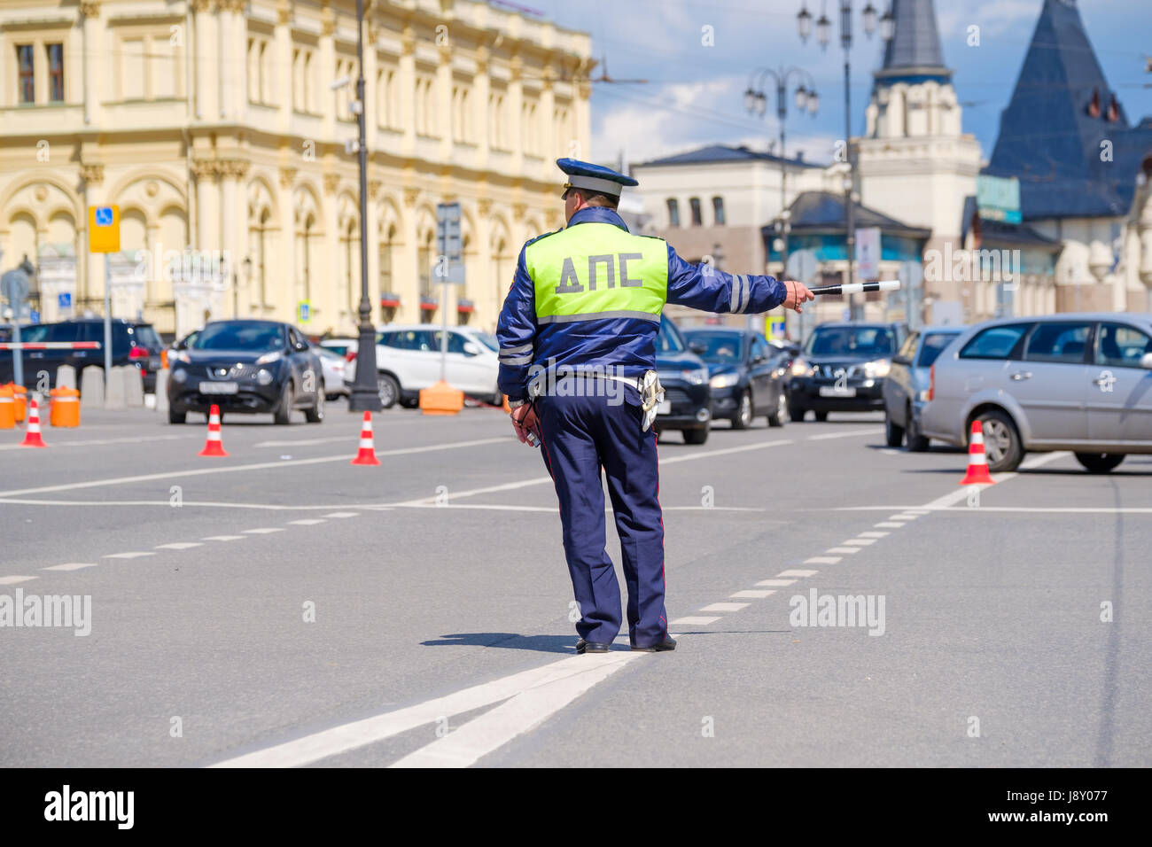 Traffic policeman works on the street at day time Stock Photo - Alamy