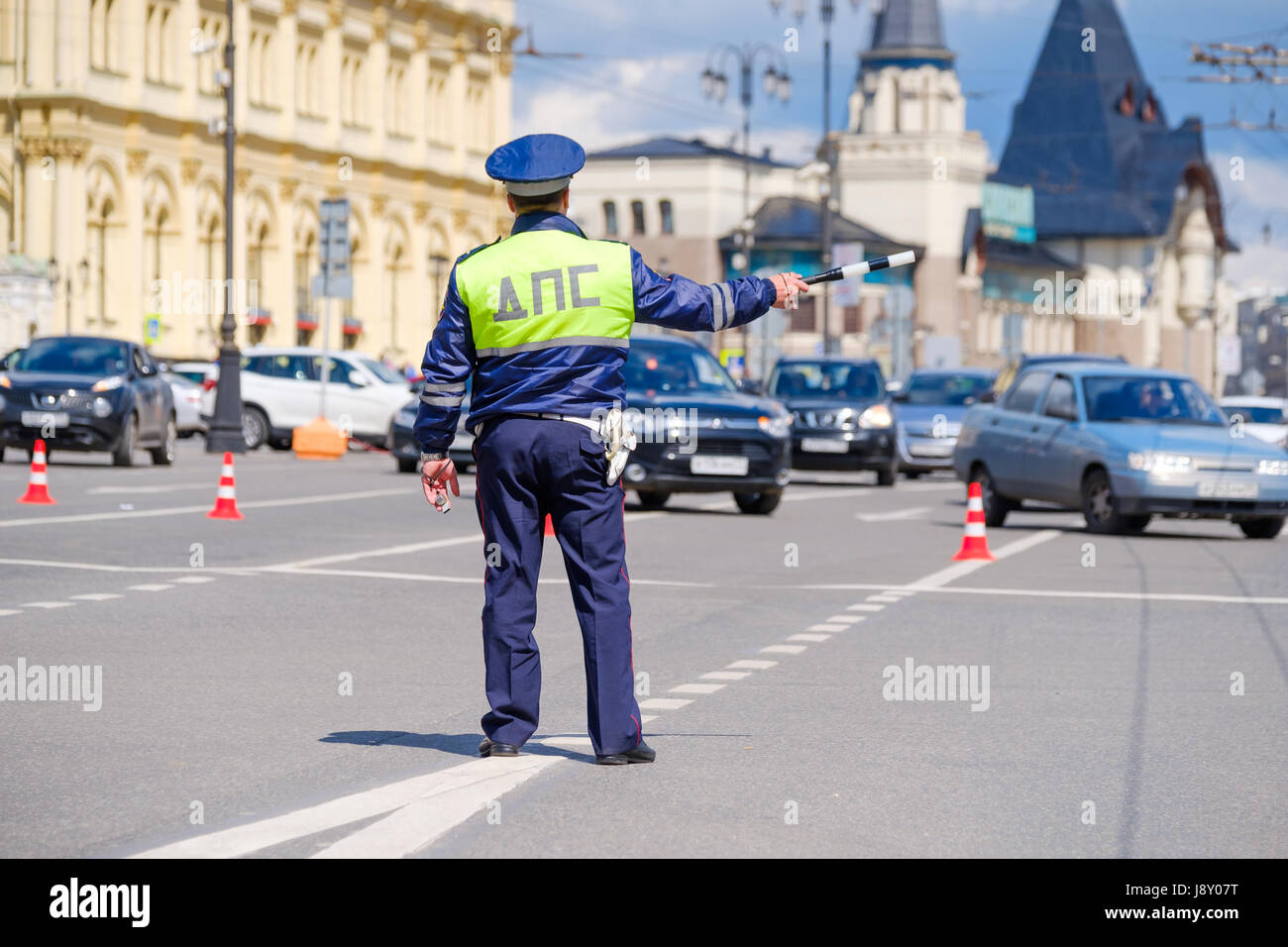 Traffic policeman works on the street at day time Stock Photo - Alamy