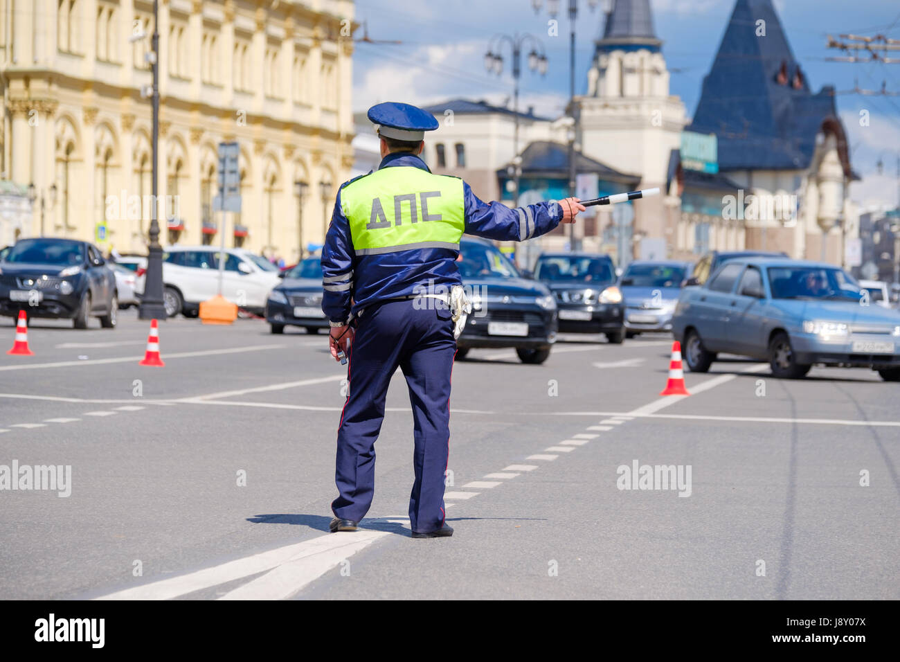 Traffic policeman works on the street at day time Stock Photo - Alamy