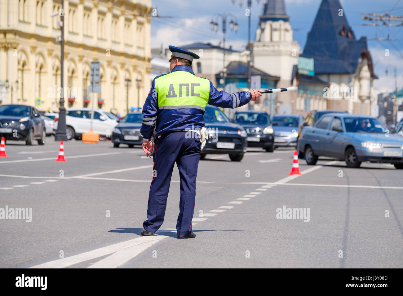 Traffic policeman works on the street at day time Stock Photo - Alamy