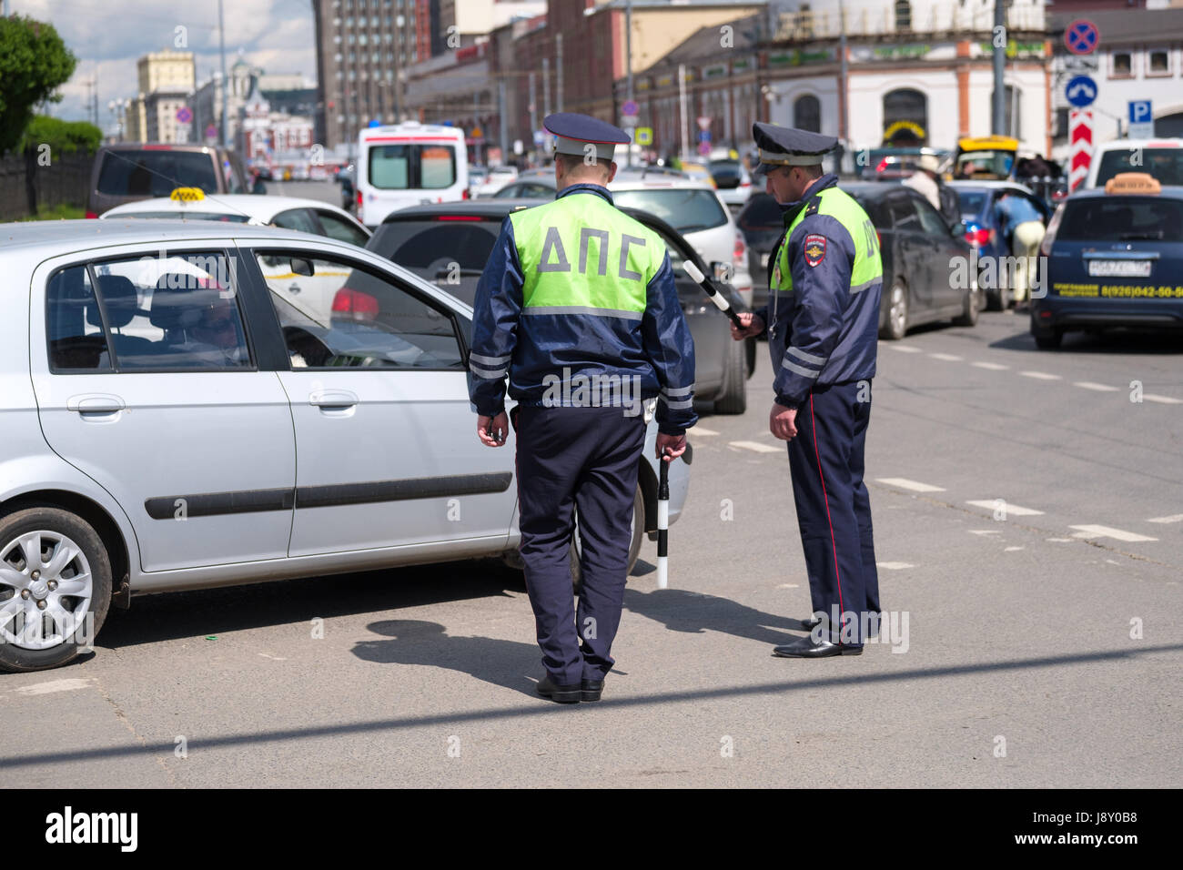 Traffic policeman works on the street at day time Stock Photo - Alamy