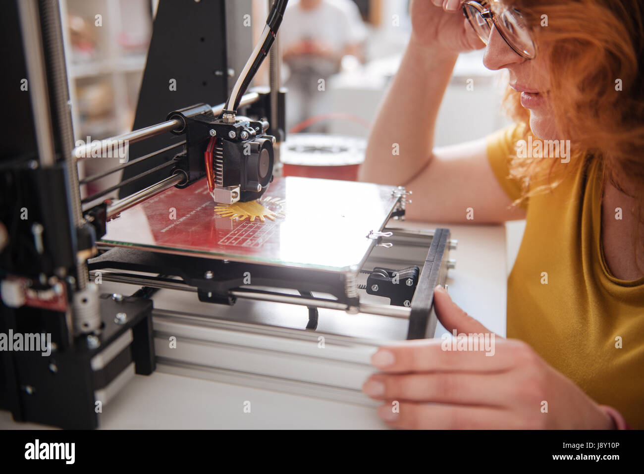 Close up of a 3d printer being in work Stock Photo - Alamy