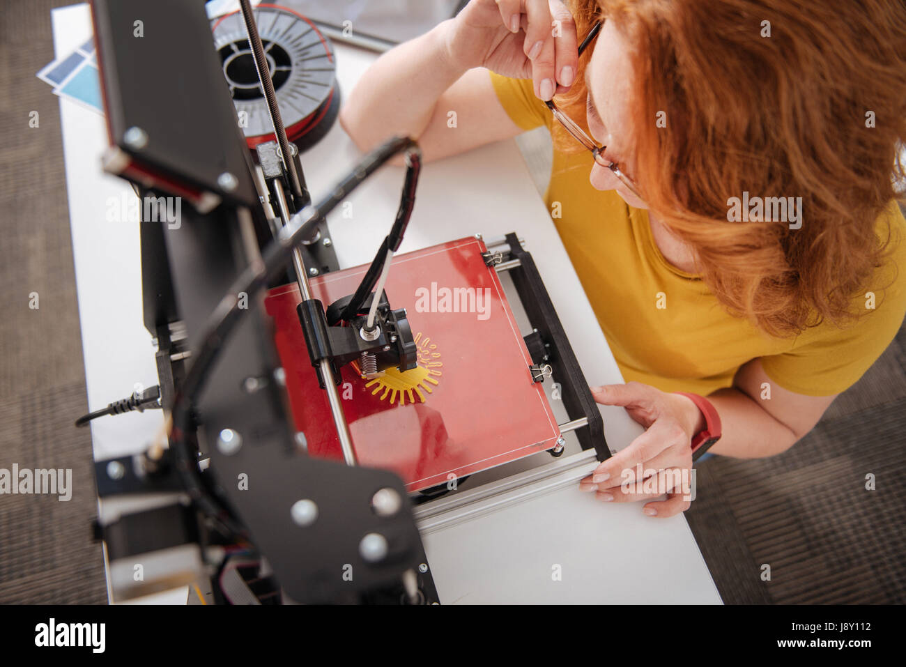 Top view of a modern 3d printer creating an object Stock Photo - Alamy