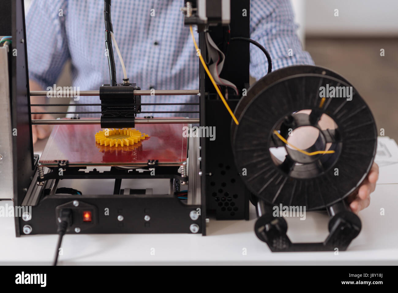 Close up of a 3d printer creating a new object Stock Photo - Alamy
