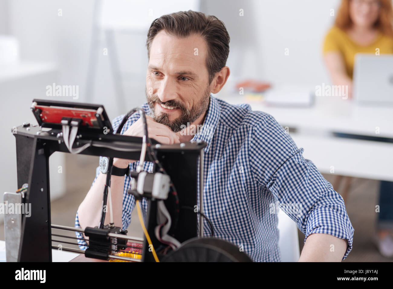 Sitting in printer hi-res stock photography and images - Alamy