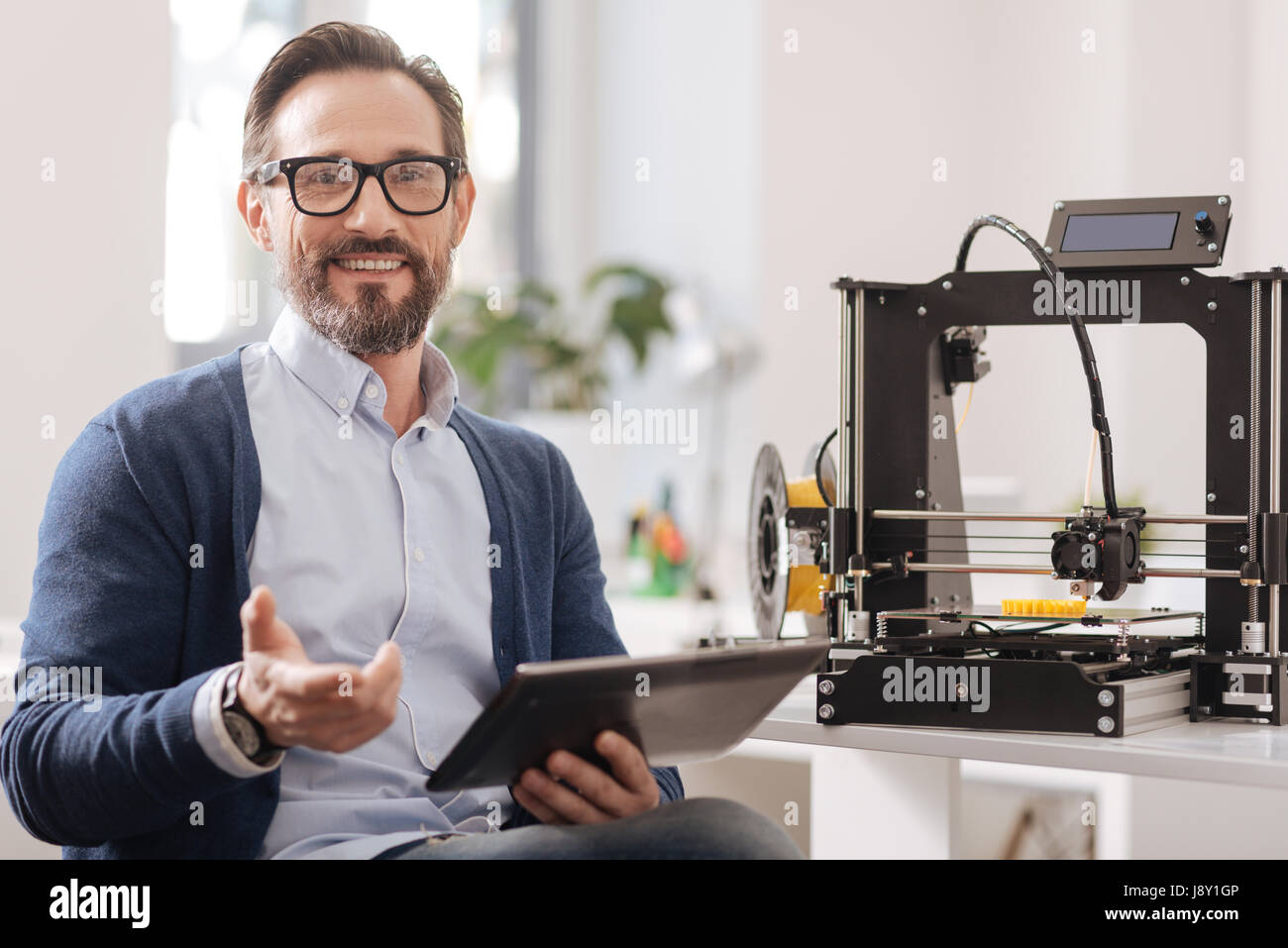 Joyful man using 3d hi-res stock photography and images - Alamy