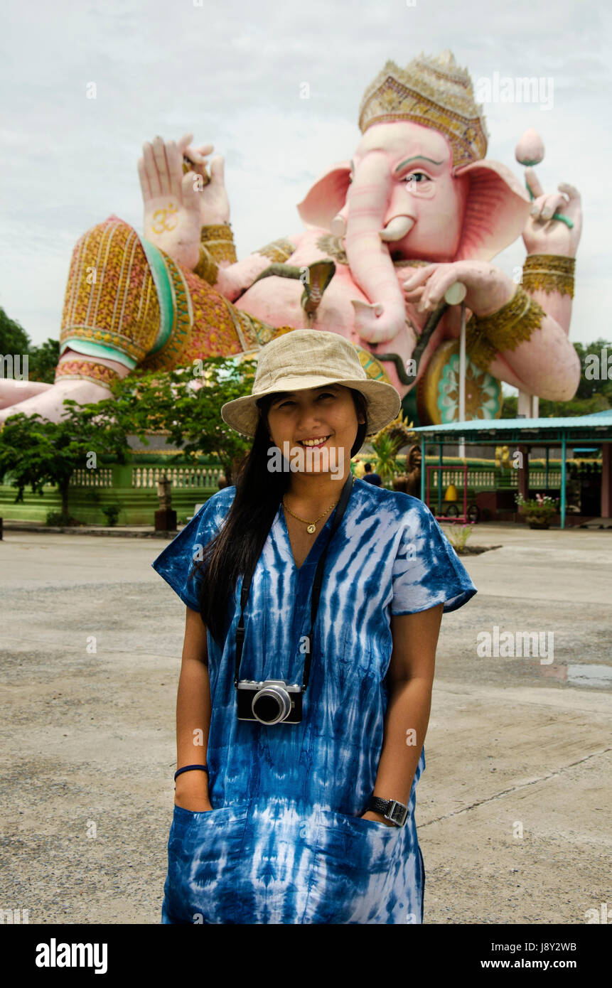 Thai woman travel and posing for take photo with Big Ganesh statue thai ...