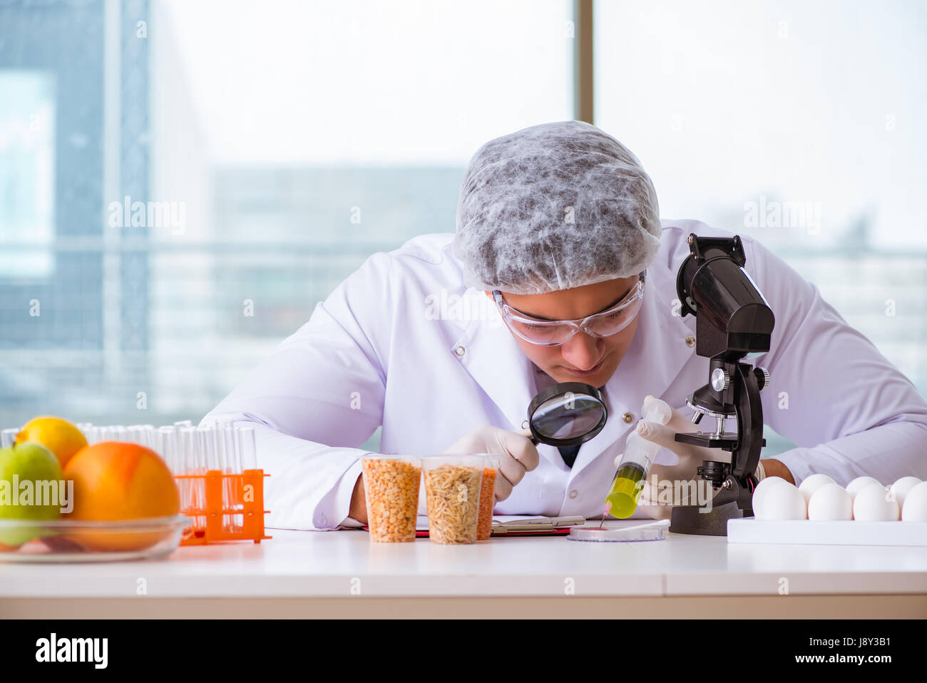 Nutrition expert testing food products in lab Stock Photo - Alamy