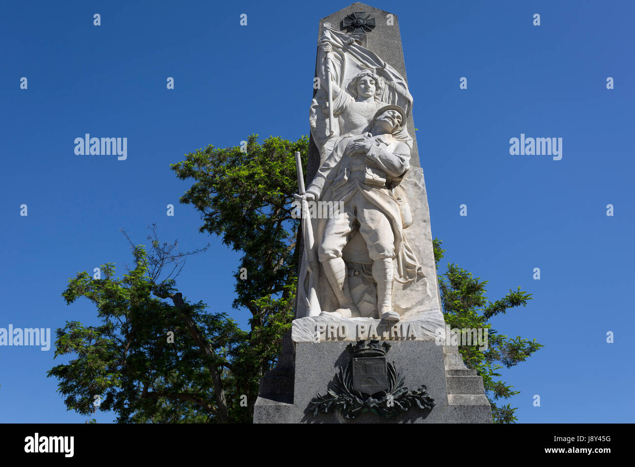 The WW1 war memorial with the Latin Pro Patria inscription on the main ...
