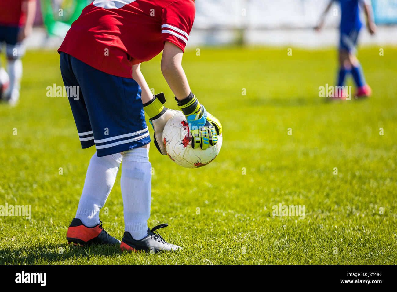Youth Soccer Goalkeeper Catch. Football Soccer Game. Kids Playing ...