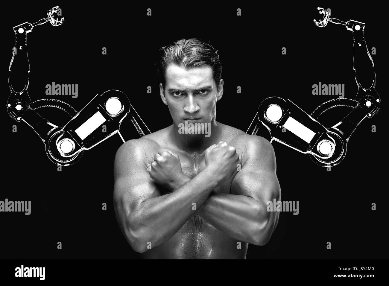 Businessman man with robotic arms Stock Photo - Alamy