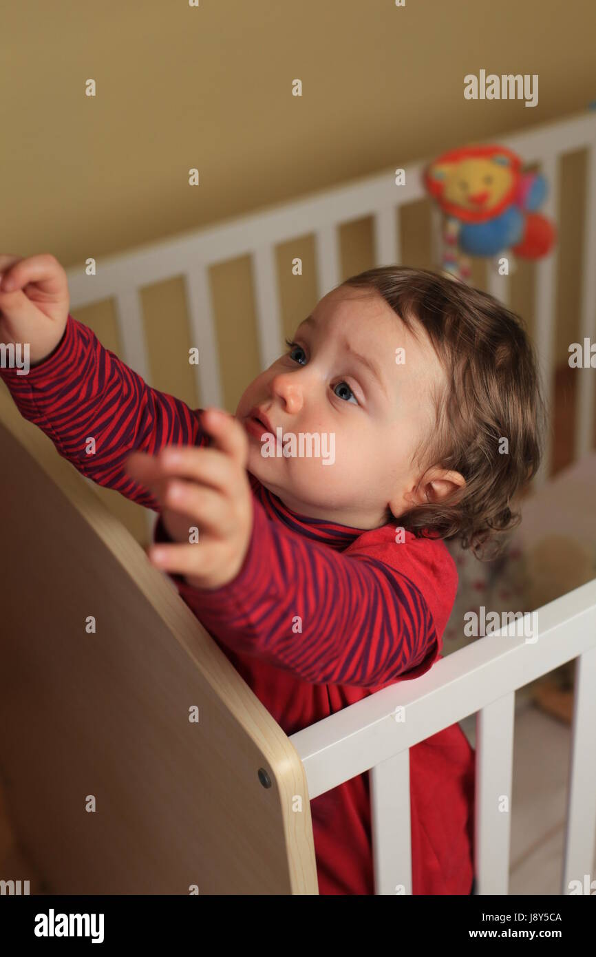 child in his crib Stock Photo - Alamy