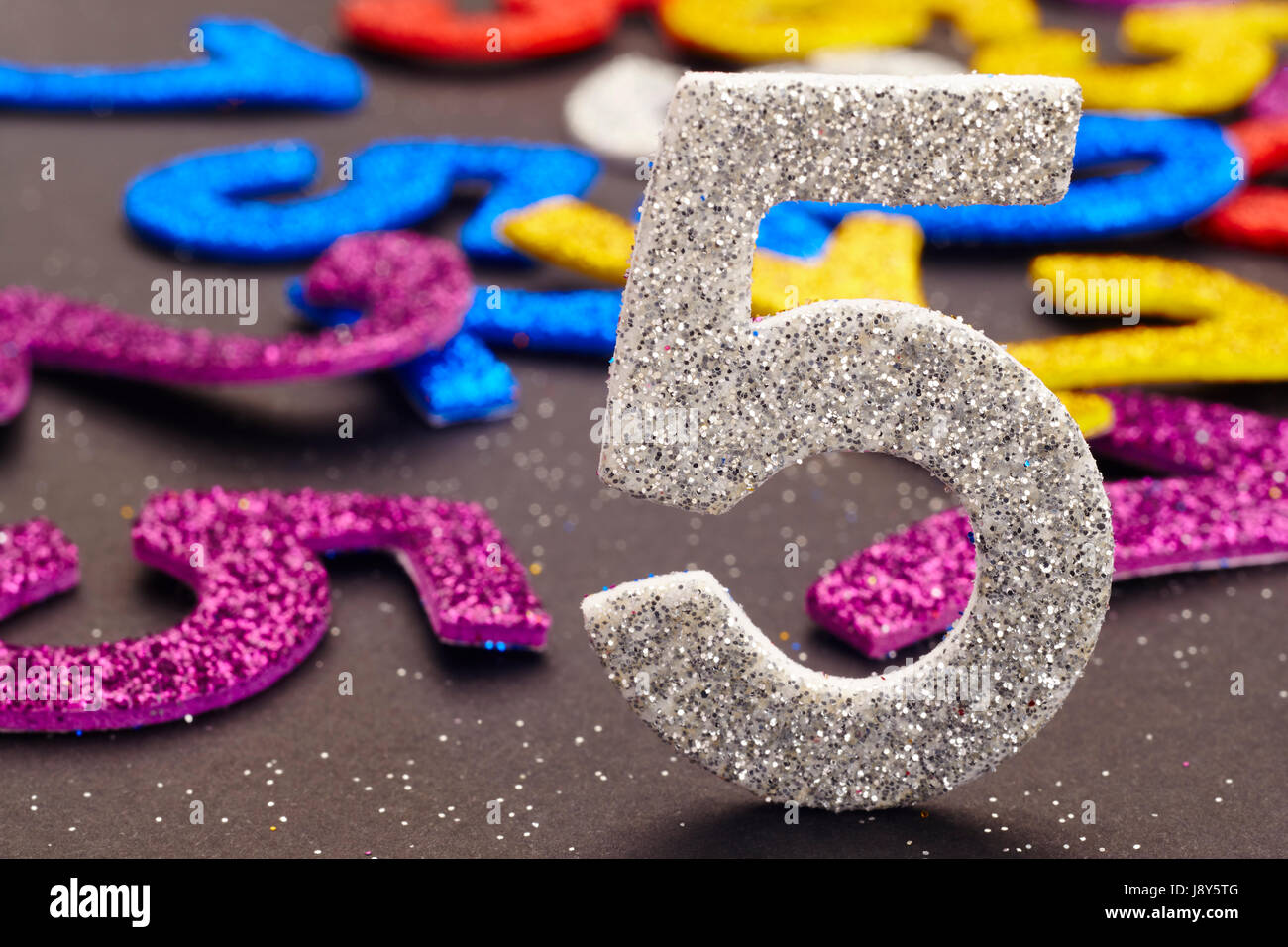 Number five silver color over a colored background. Anniversary ...