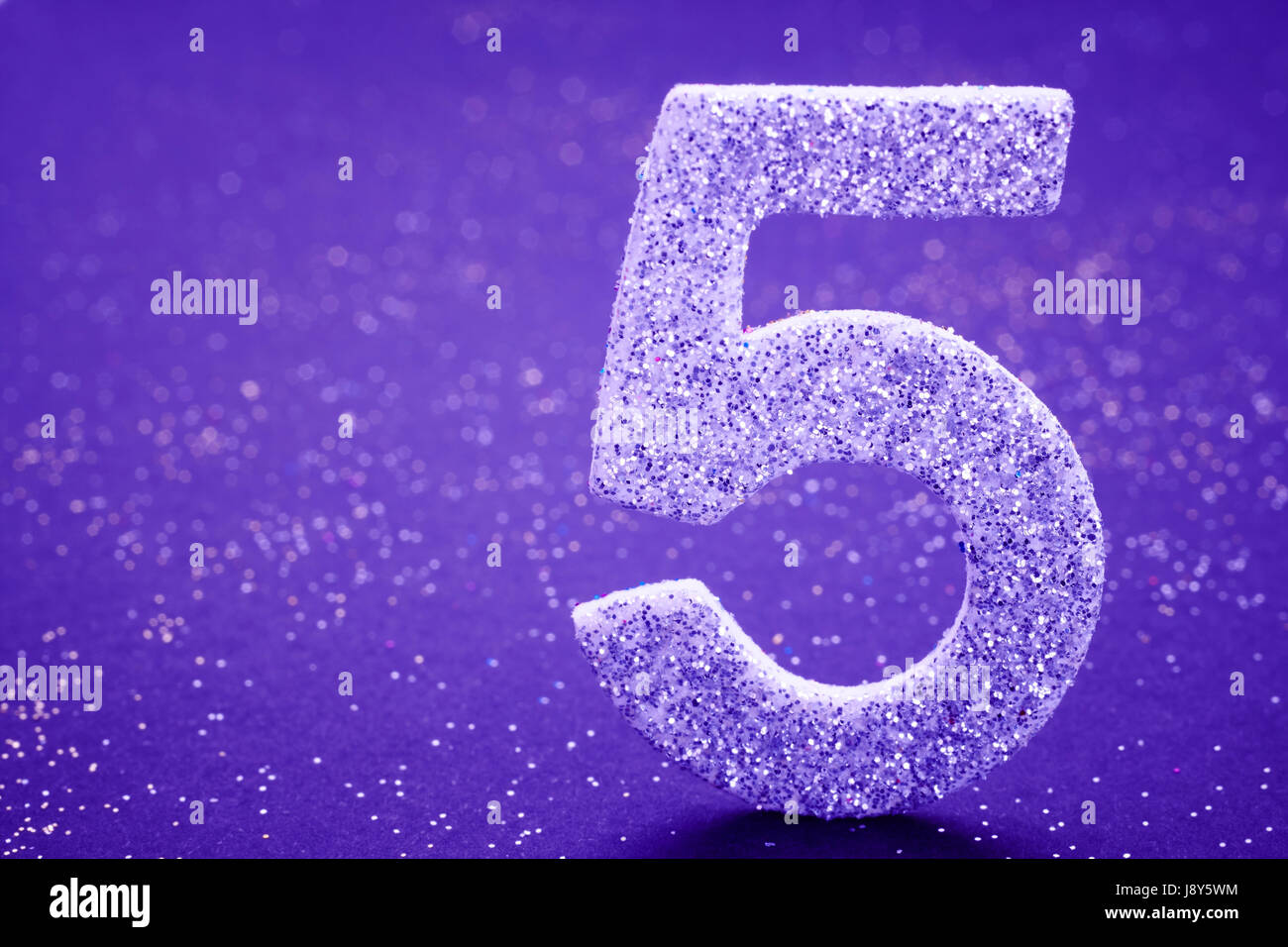Number five purple color over a purple background. Anniversary ...