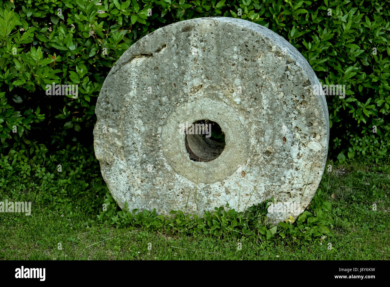 Very ancient stone for grinding olive oil Stock Photo - Alamy