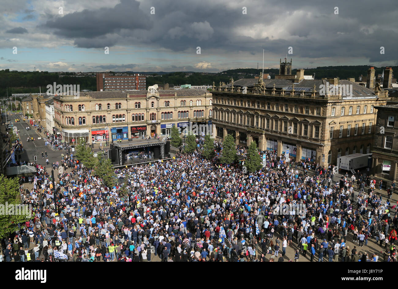 Fans gather round the stage ahead of Huddersfield Town's promotion ...