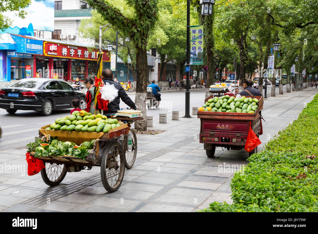 Guilin, China. Mango Vendors with their Carts on Sidewalk Stock Photo ...