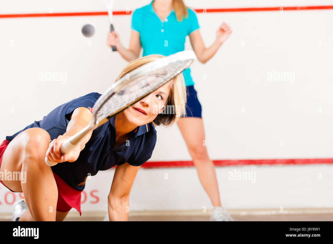 women playing squash sport gym Stock Photo - Alamy