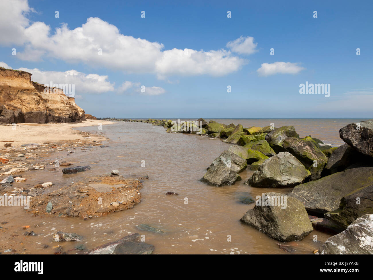 The beach at Happisburgh in Norfolk England, UK showing debris from ...