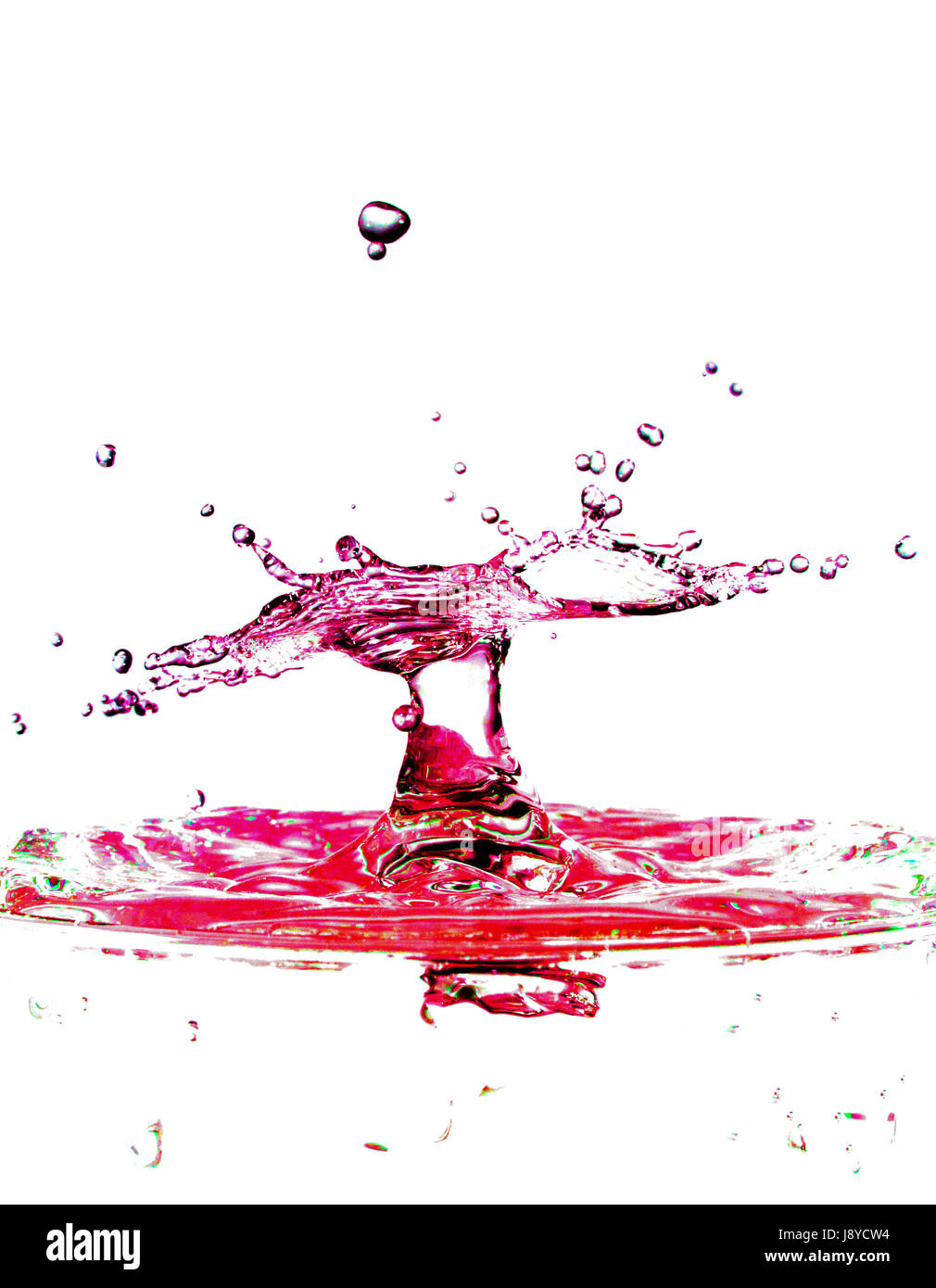 Colorful liquid splash isolated on white background closeup Stock Photo ...