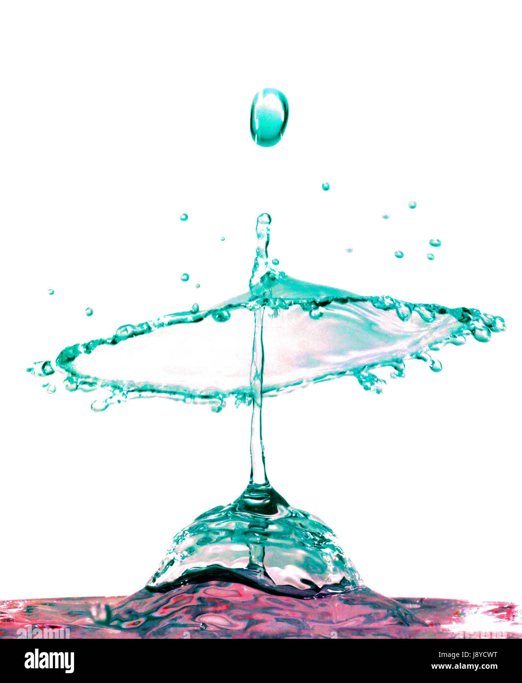 Colorful liquid splash isolated on white background closeup Stock Photo ...