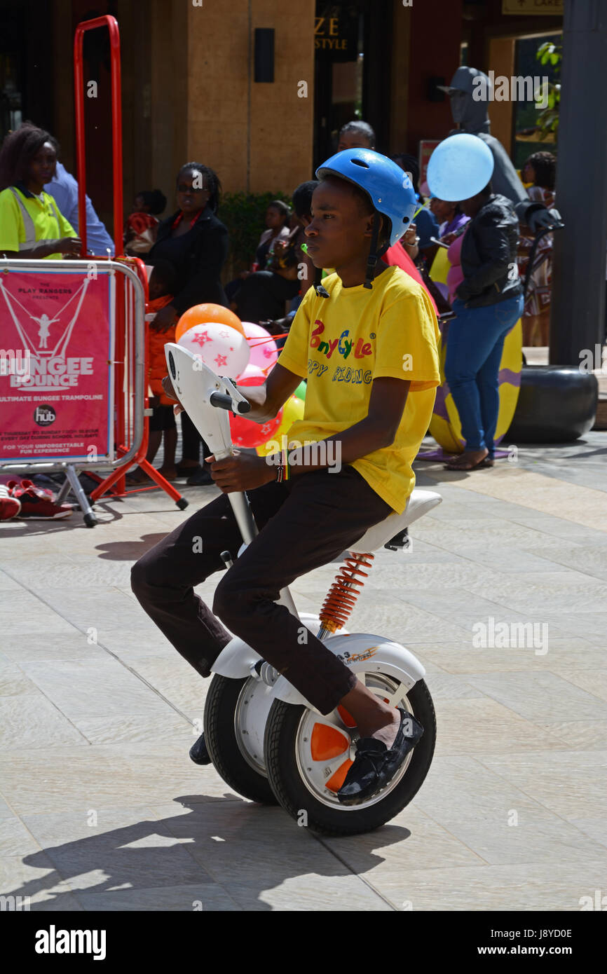 Man on sitting Segway machine.Nairobi, Kenya Stock Photo - Alamy