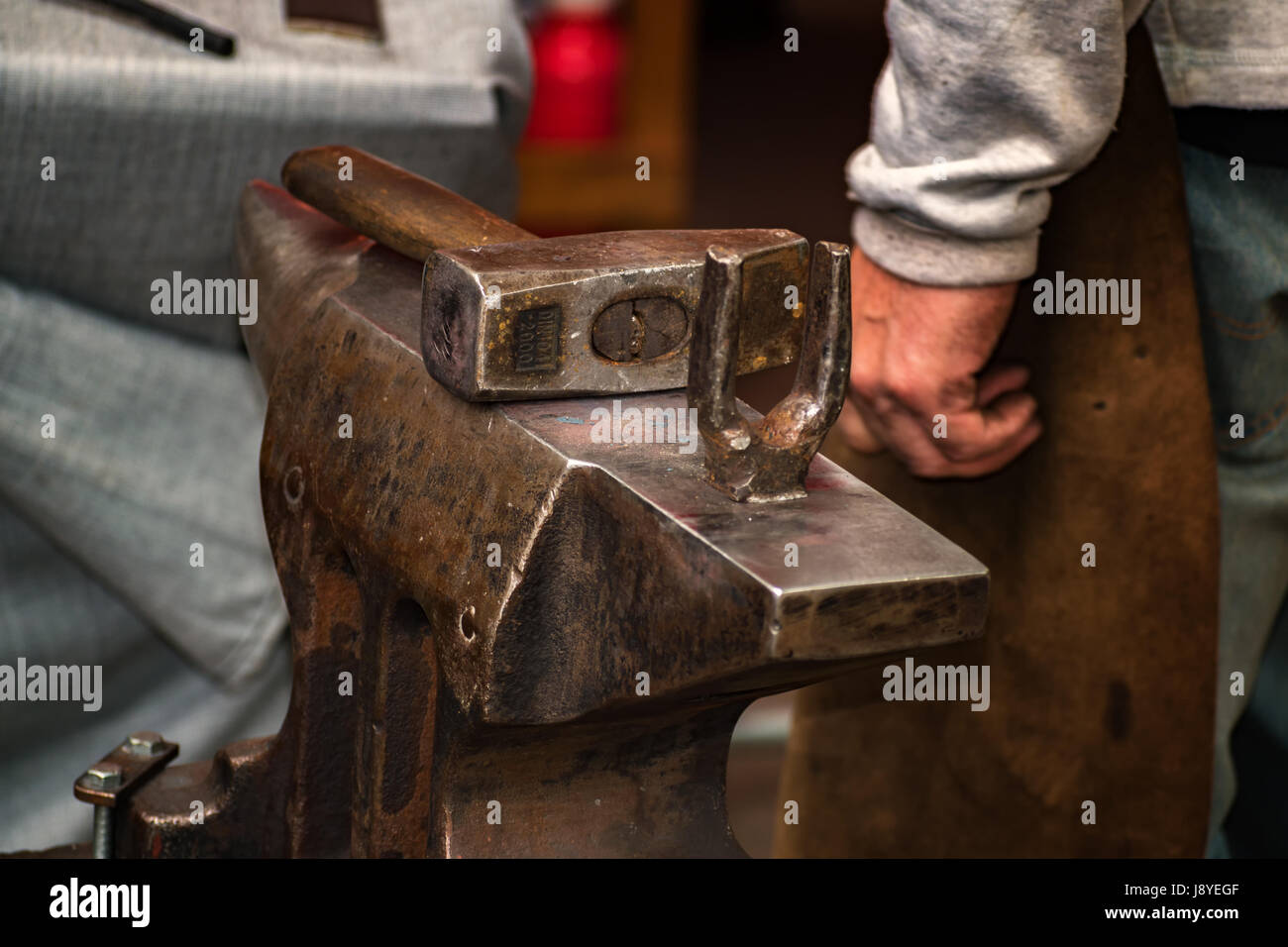 Blacksmith, smithy and blacksmith tools - Folk art Stock Photo - Alamy