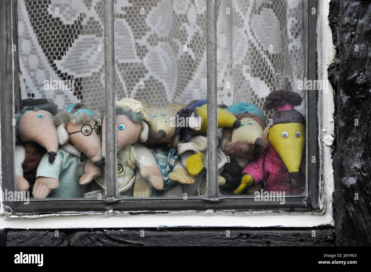 collection of womble soft toys in window Stock Photo - Alamy