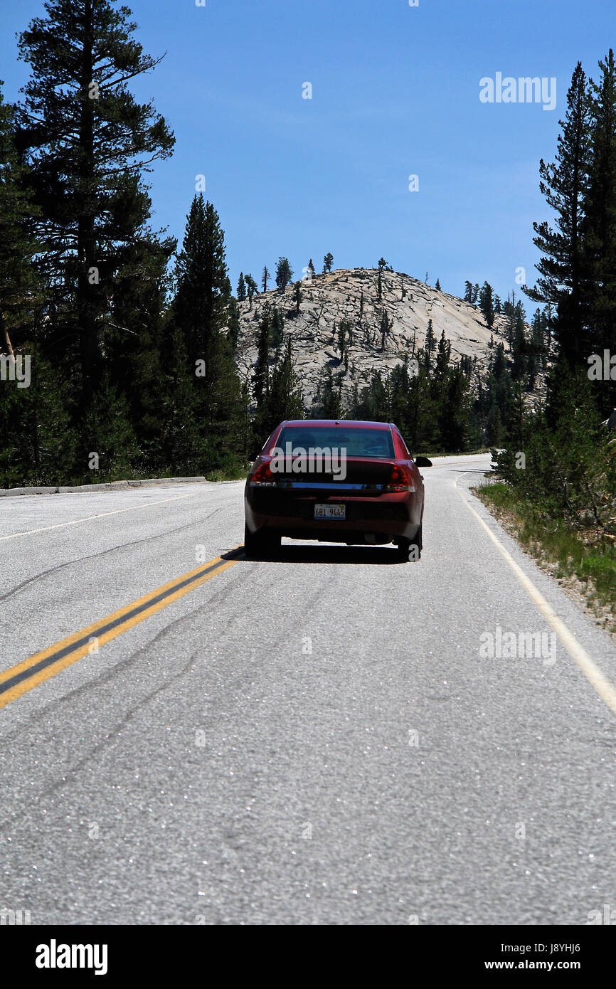 A Vehicle, car. speeds along the road in yosemite valley - Yosemite ...