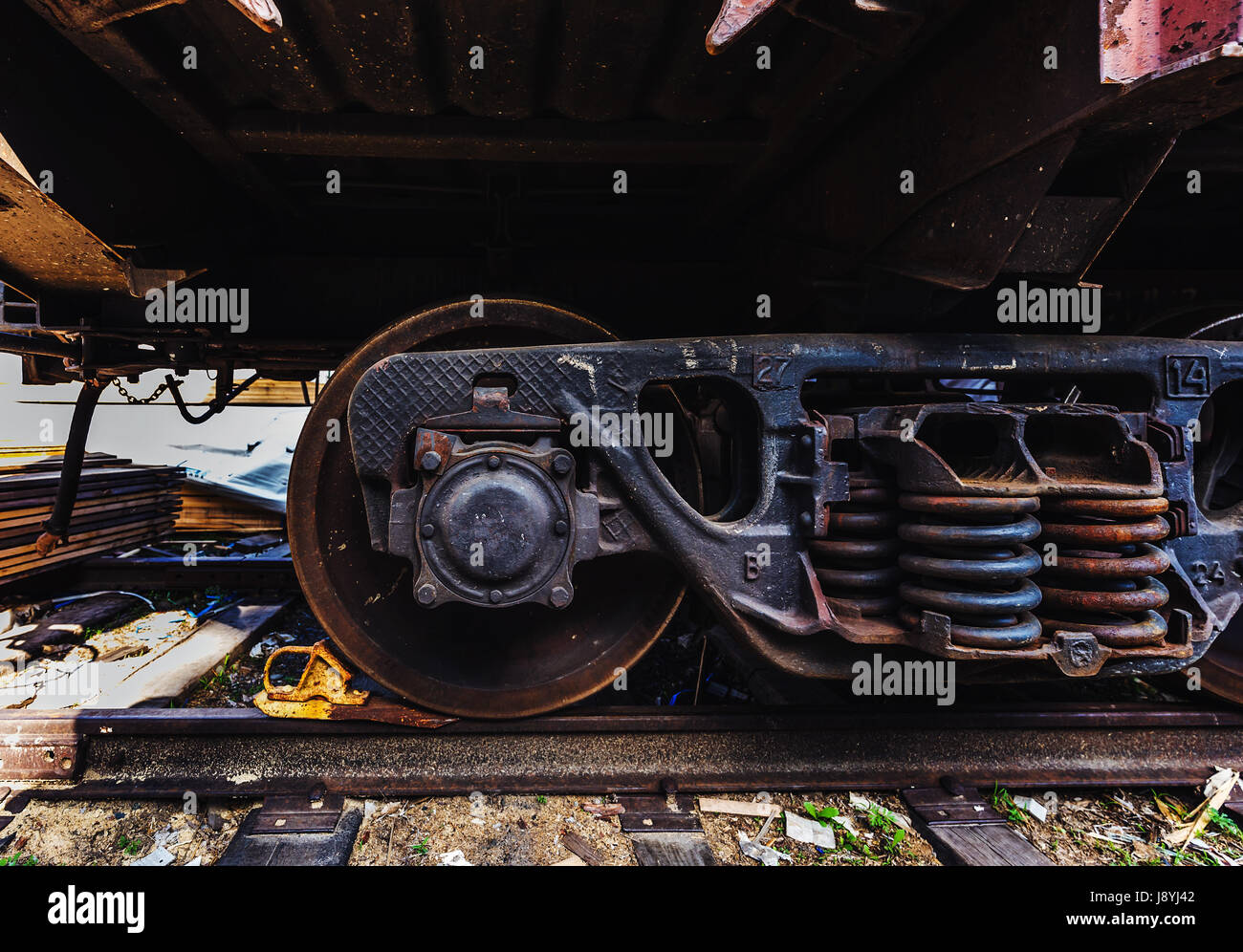 Close-up Steel diesel railcar train bogie wheels on the tracks Stock ...
