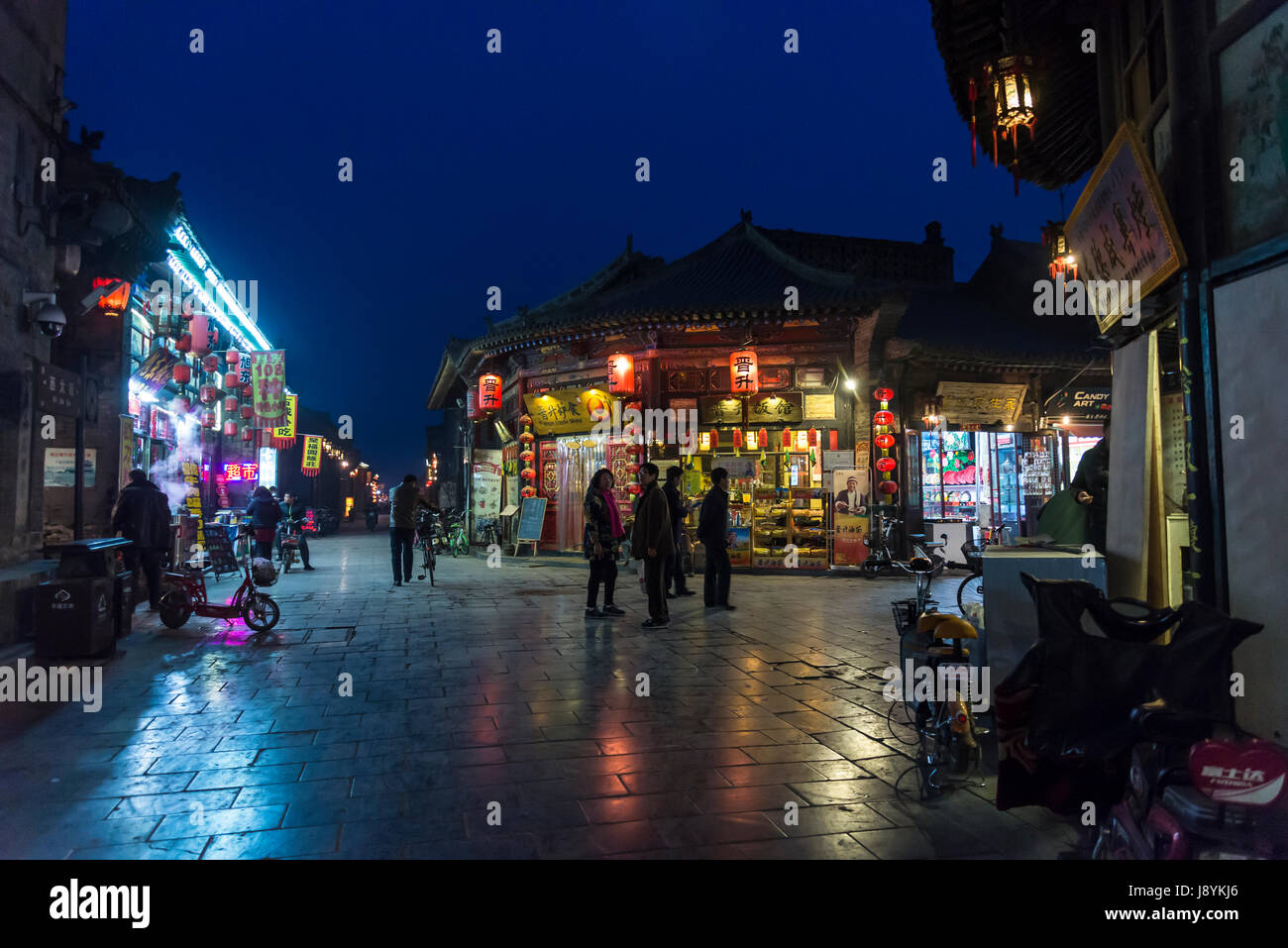 Street in historic Pingyao at night, Shanxi province, China Stock Photo ...