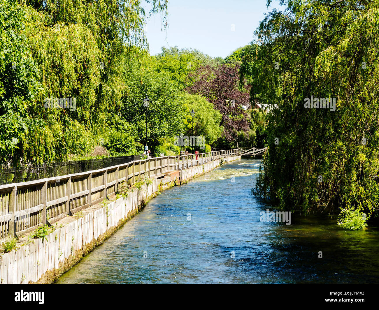 In the centre of Winchester, Hampshire the River Itchen below Town Mill ...