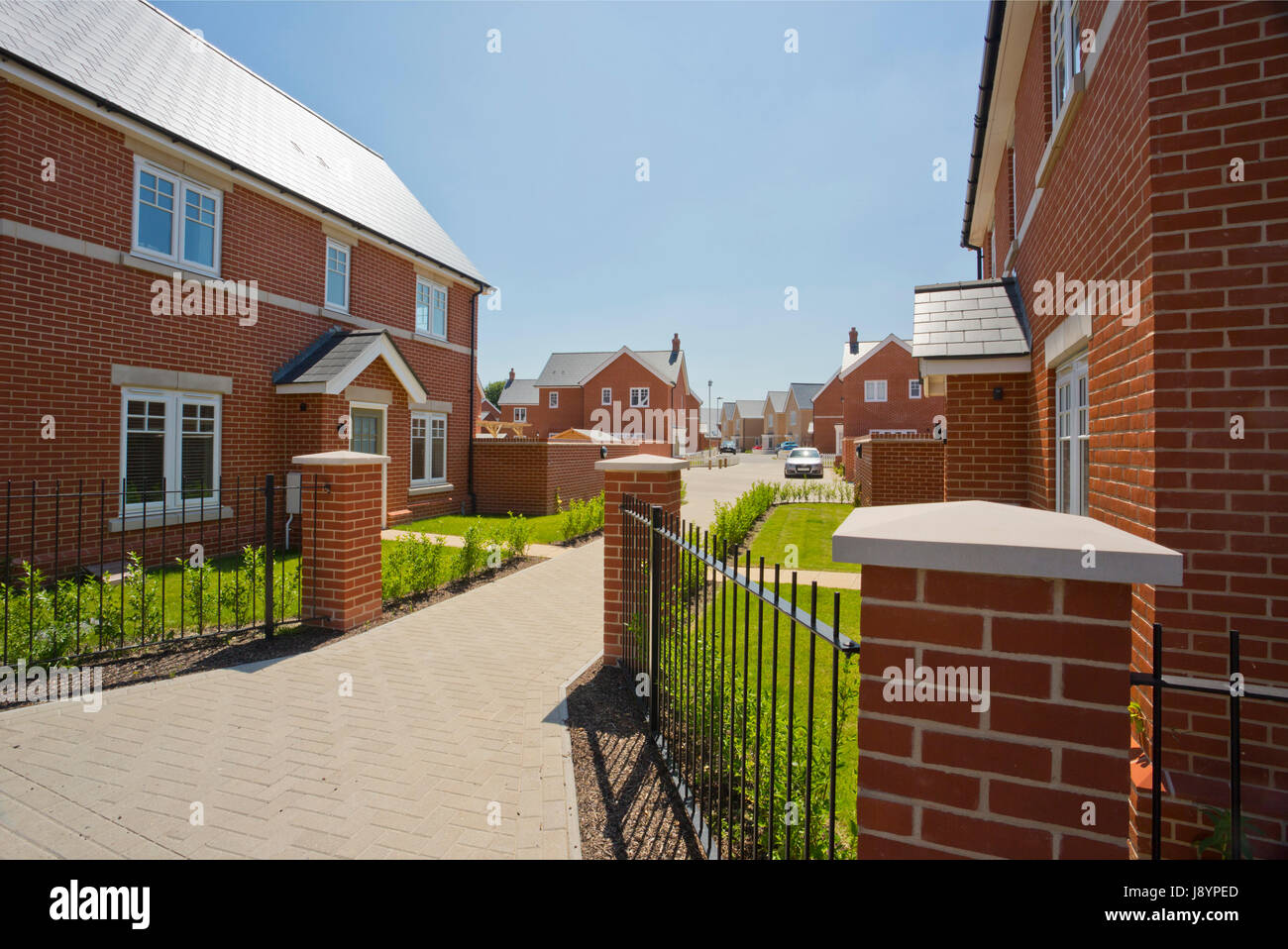 A new housing development nearing completion with empty houses Stock ...