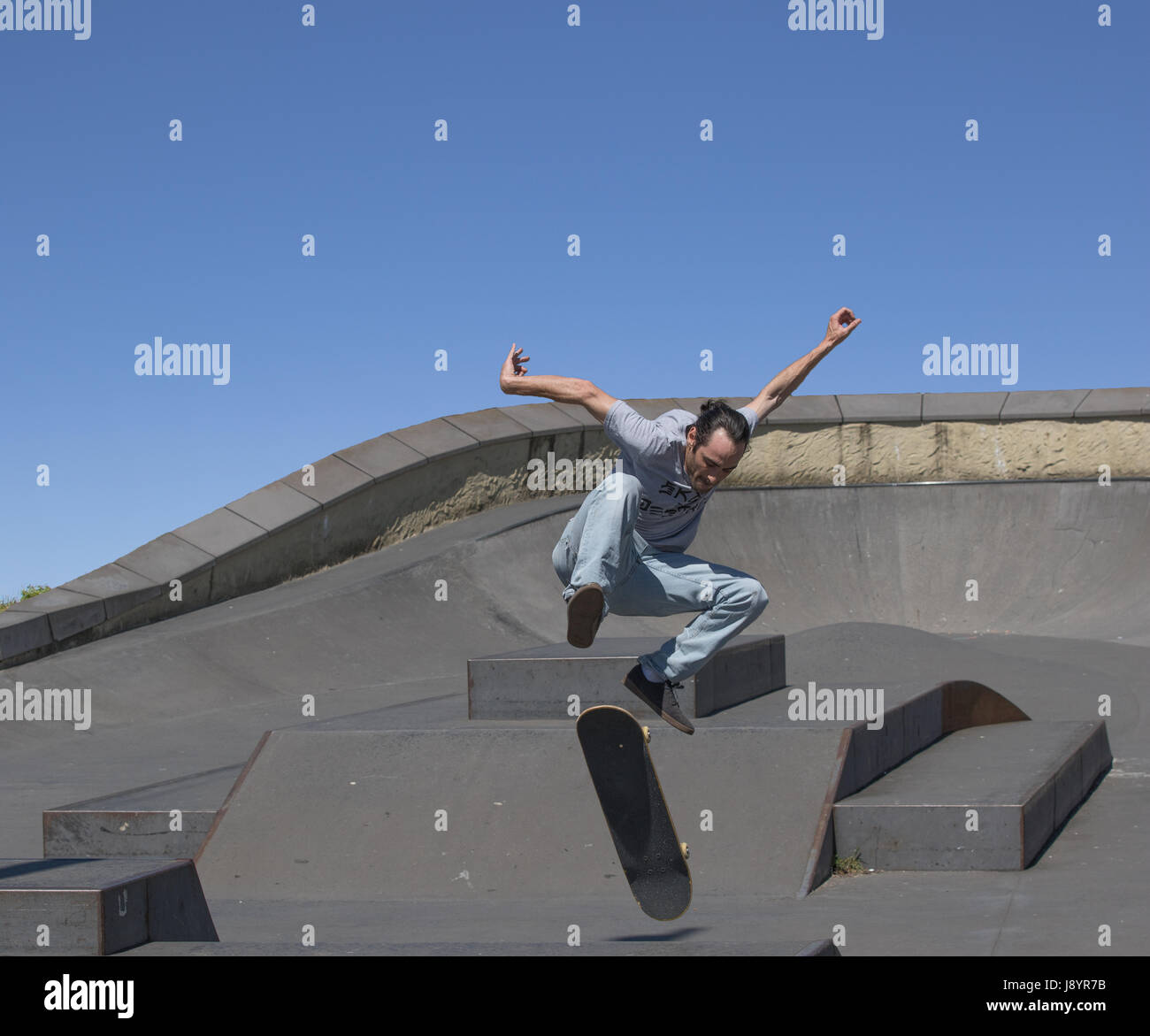 Skateboarder stunt ollie hi-res stock photography and images - Alamy