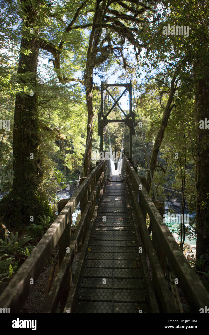 Woman girl walking bridge river hi-res stock photography and images - Alamy