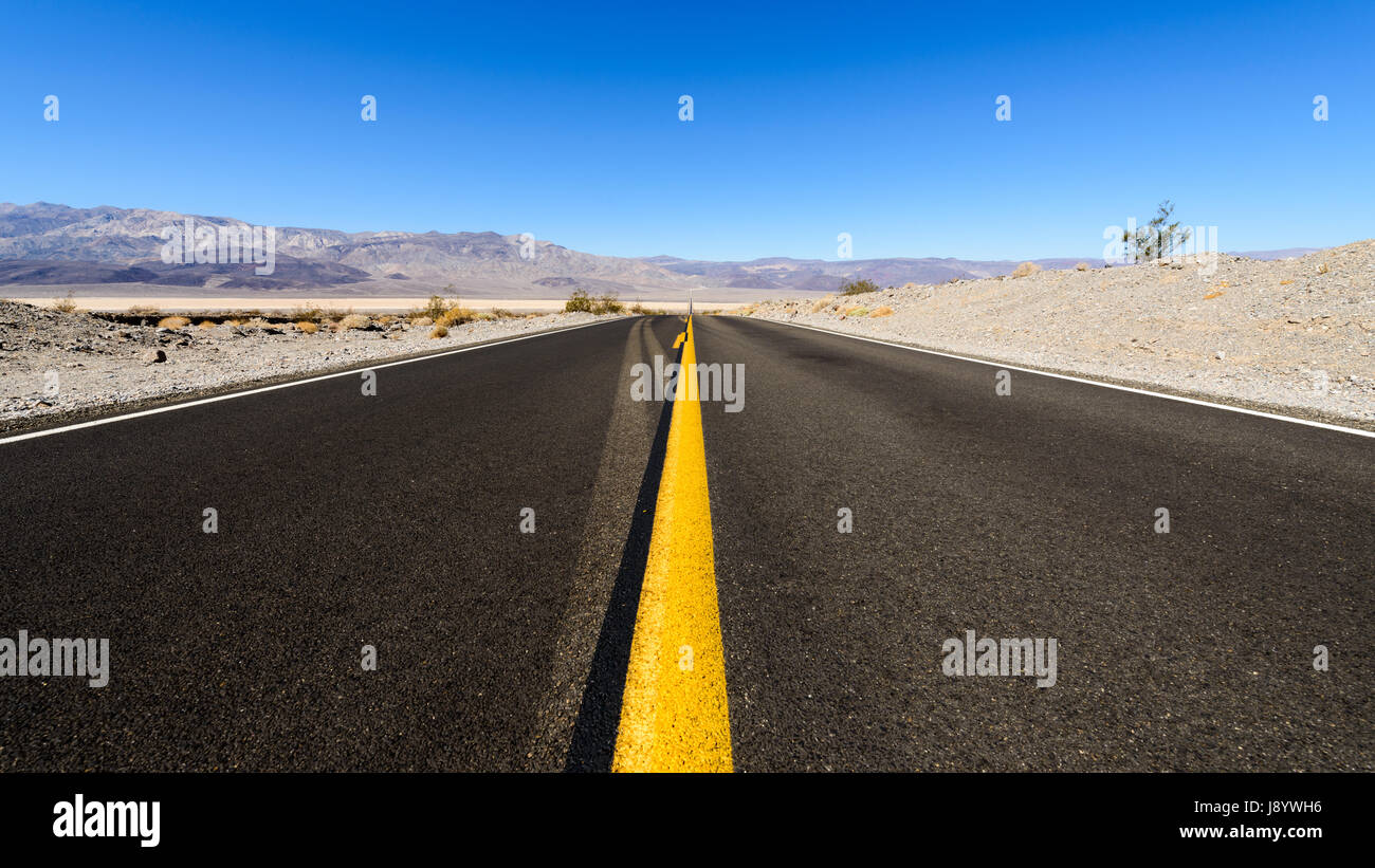 Empty straight road in Death Valley, California, USA Stock Photo - Alamy