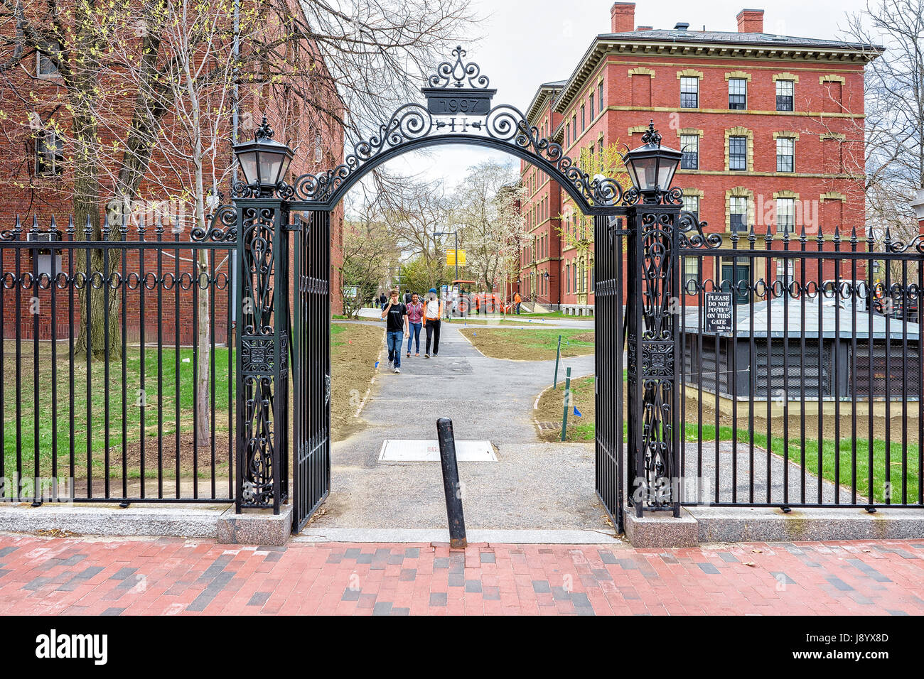 Cambridge, USA - April 29, 2015: Entrance gate into Harvard Yard in ...