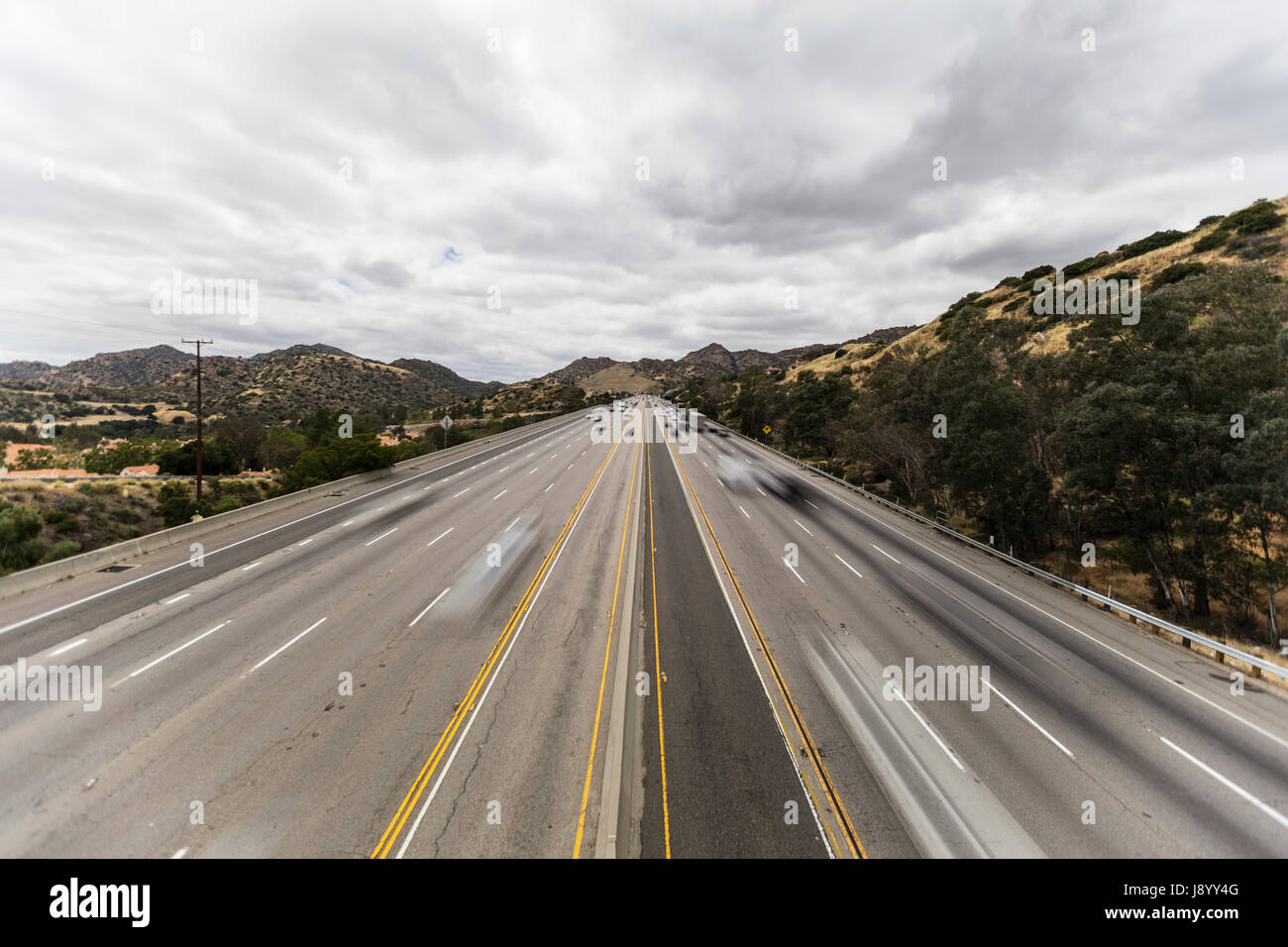Ten lane 118 freeway with motion blurred vehicles in the San Fernando ...