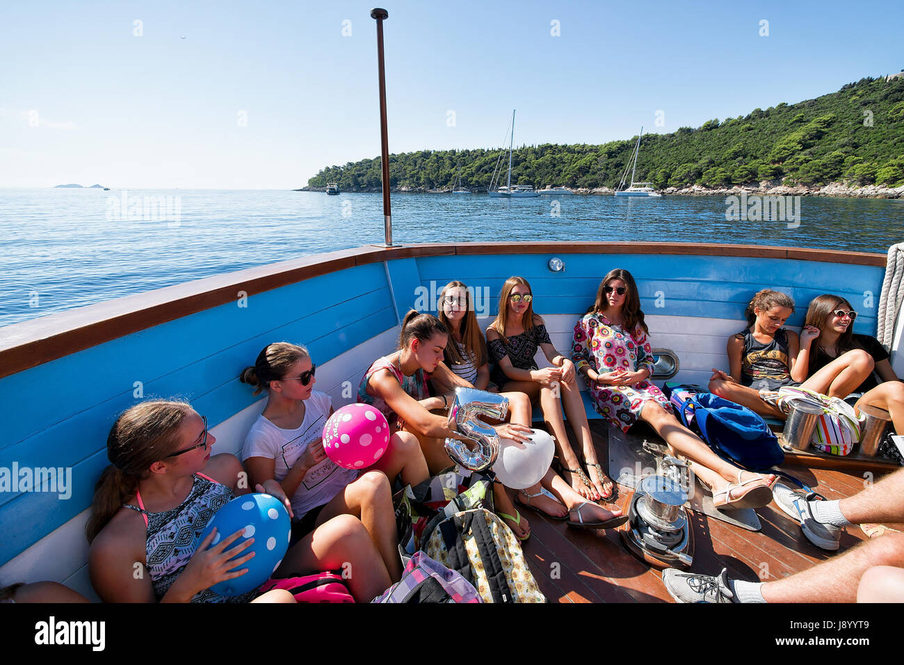 Dubrovnik, Croatia - August 19, 2016: Young girls having a party in the ...