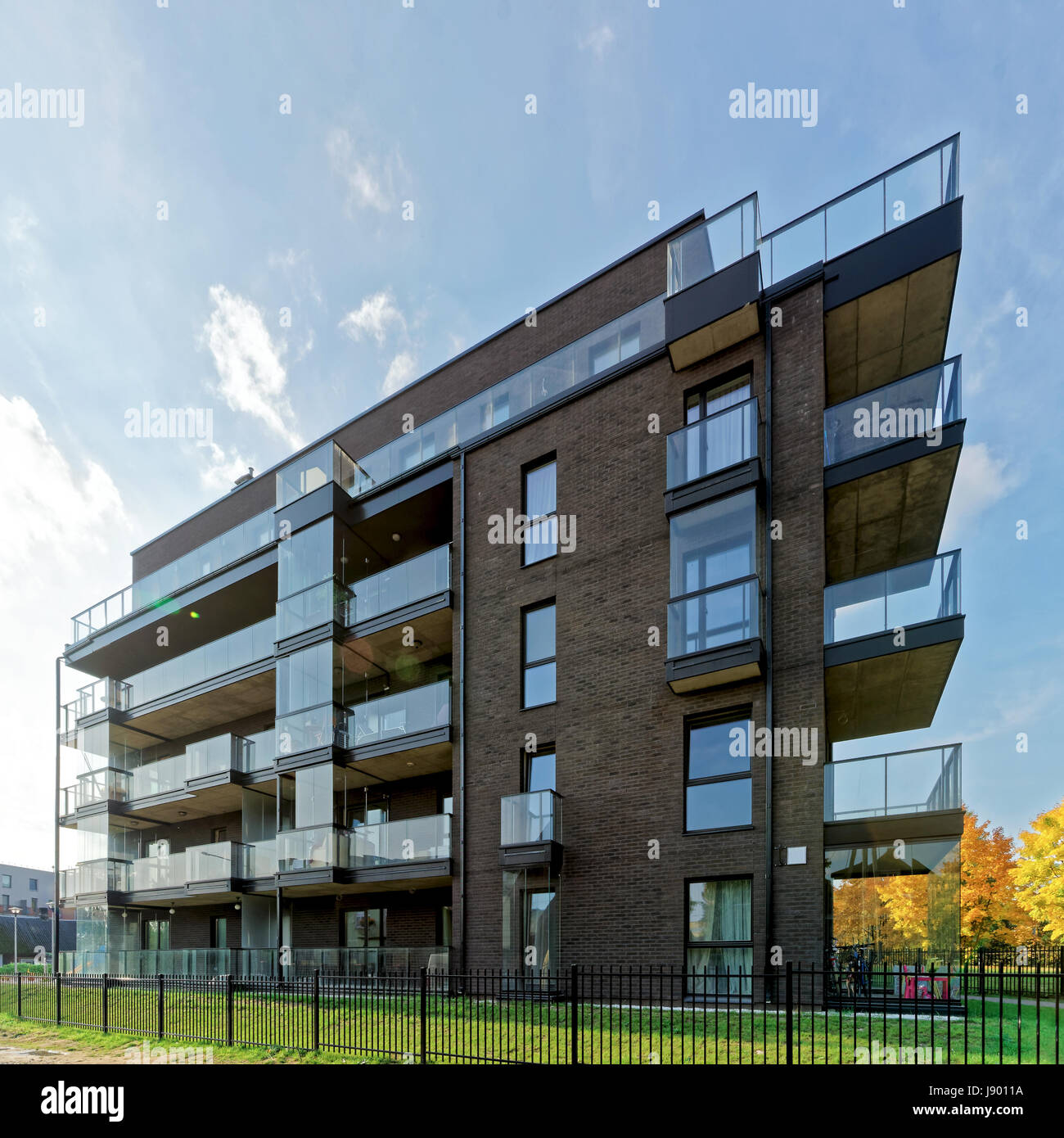 Modern glass architecture of apartment residential building. And ...