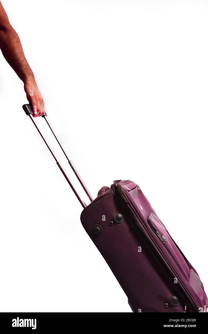 Pulling trolley bag Stock Photo - Alamy