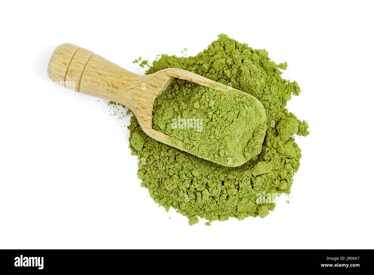 Moringa oleifera powder with wooden scoop isolated on white background ...