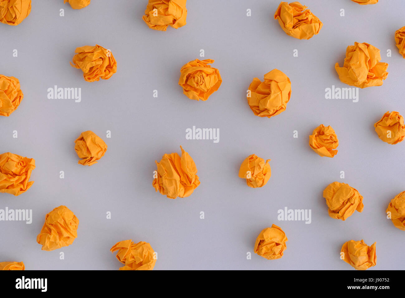Yellow crumpled paper balls. Idea сoncept Stock Photo - Alamy