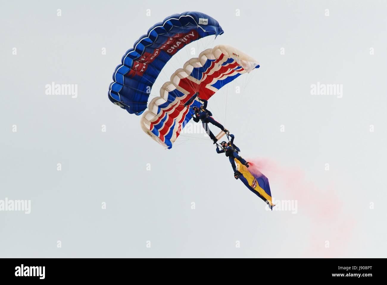 The Tigers army parachute display team perform at the Dunsfold airshow ...