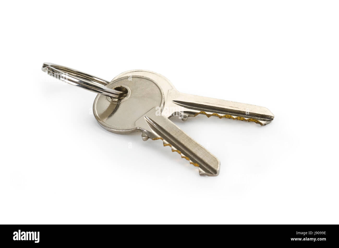 Two keys on bright background Stock Photo - Alamy