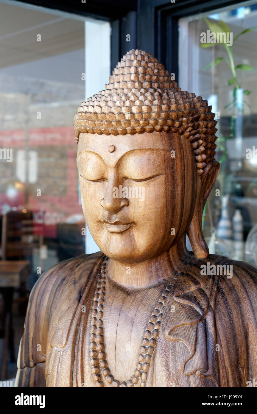 Wooden buddha hi-res stock photography and images - Alamy
