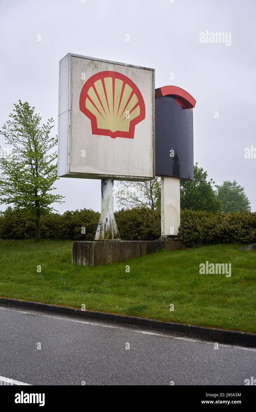 Shell logo in a signboard in a parking area on the highway in France ...